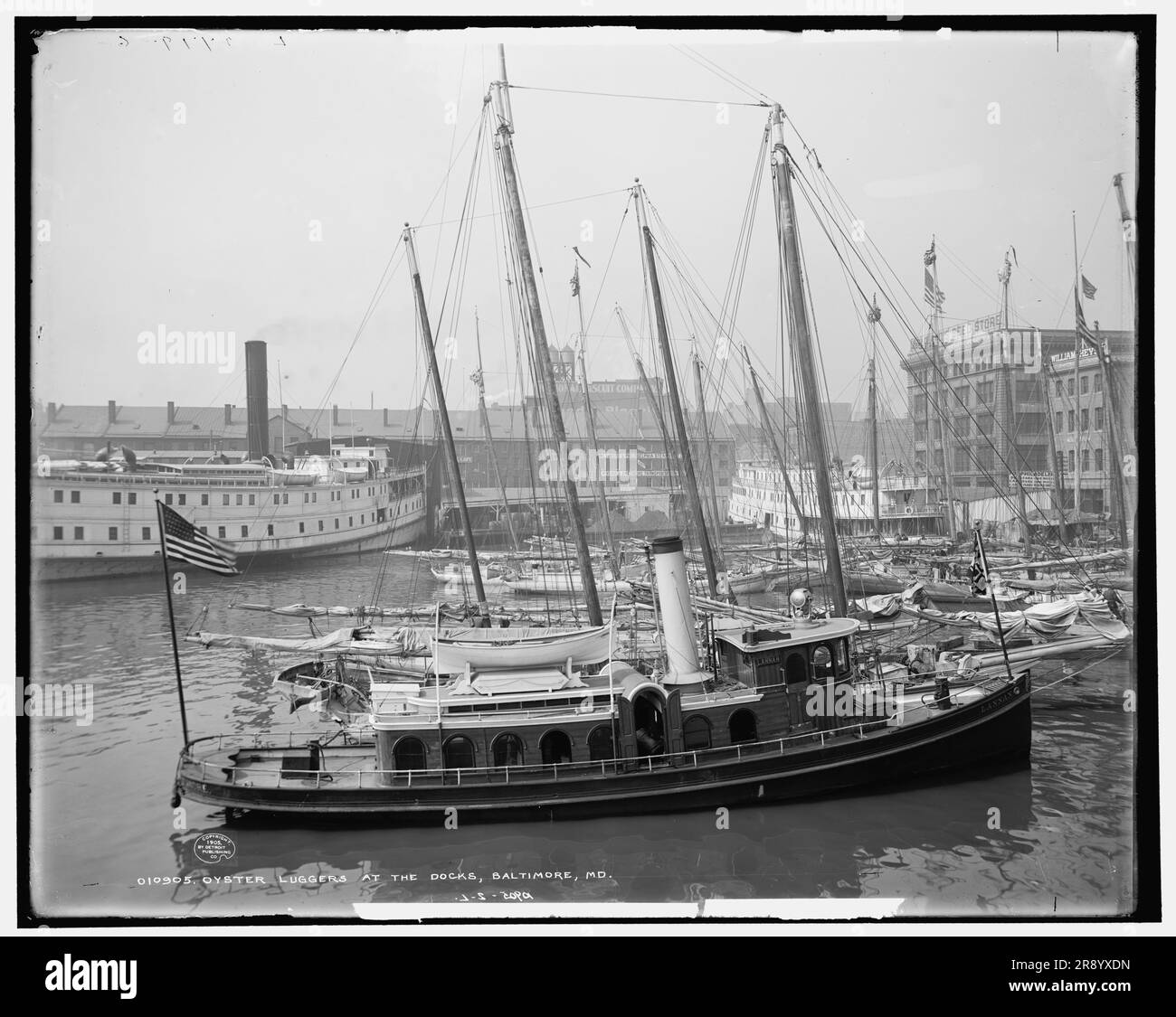 Fishing boats tug in harbour Black and White Stock Photos & Images - Alamy