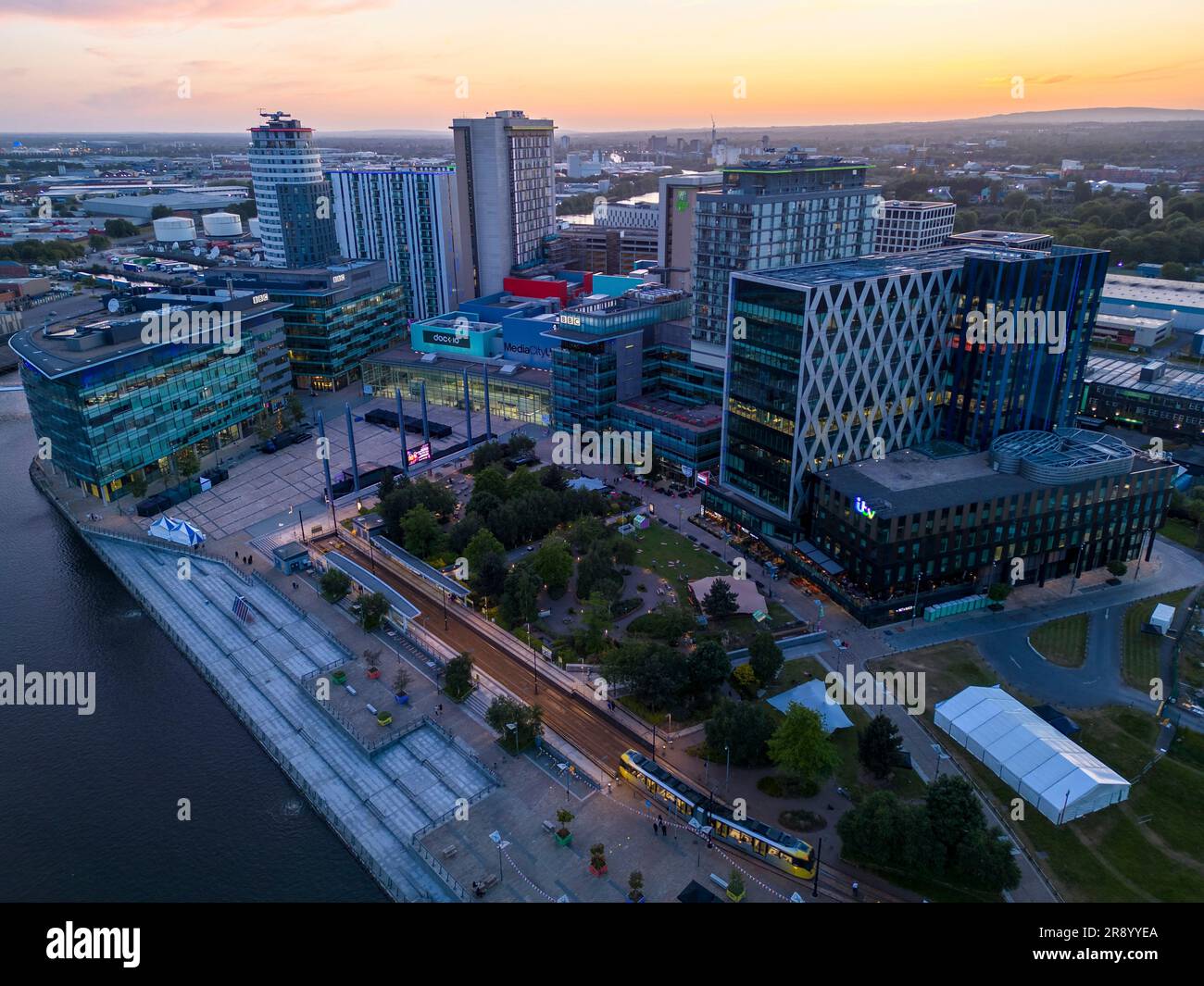 Aerial view of BBC Media City at sunset, Salford Quays, Manchester ...