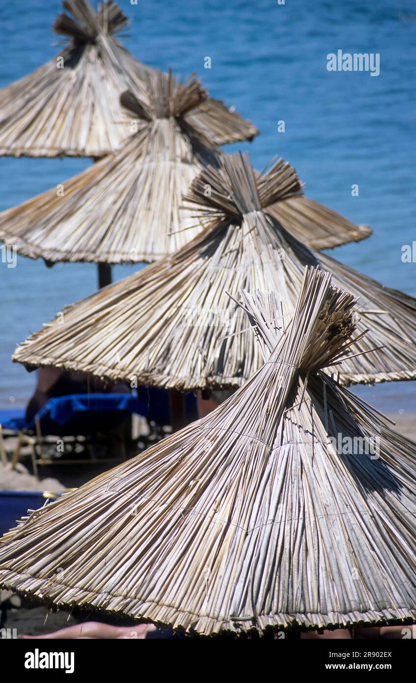 Straw parasols, Corfu, Dafnila Stock Photo - Alamy