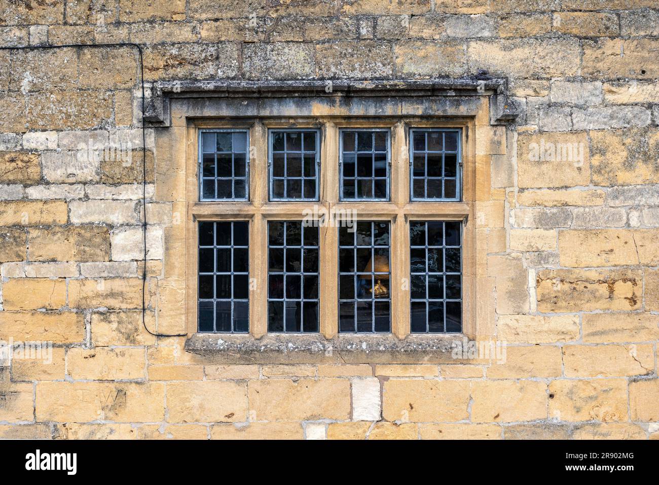 Window surrounded by Cotswoldstone yellow limestone block, Format ...