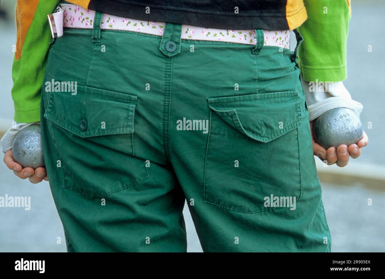 2 boules balls in the hand Stock Photo - Alamy