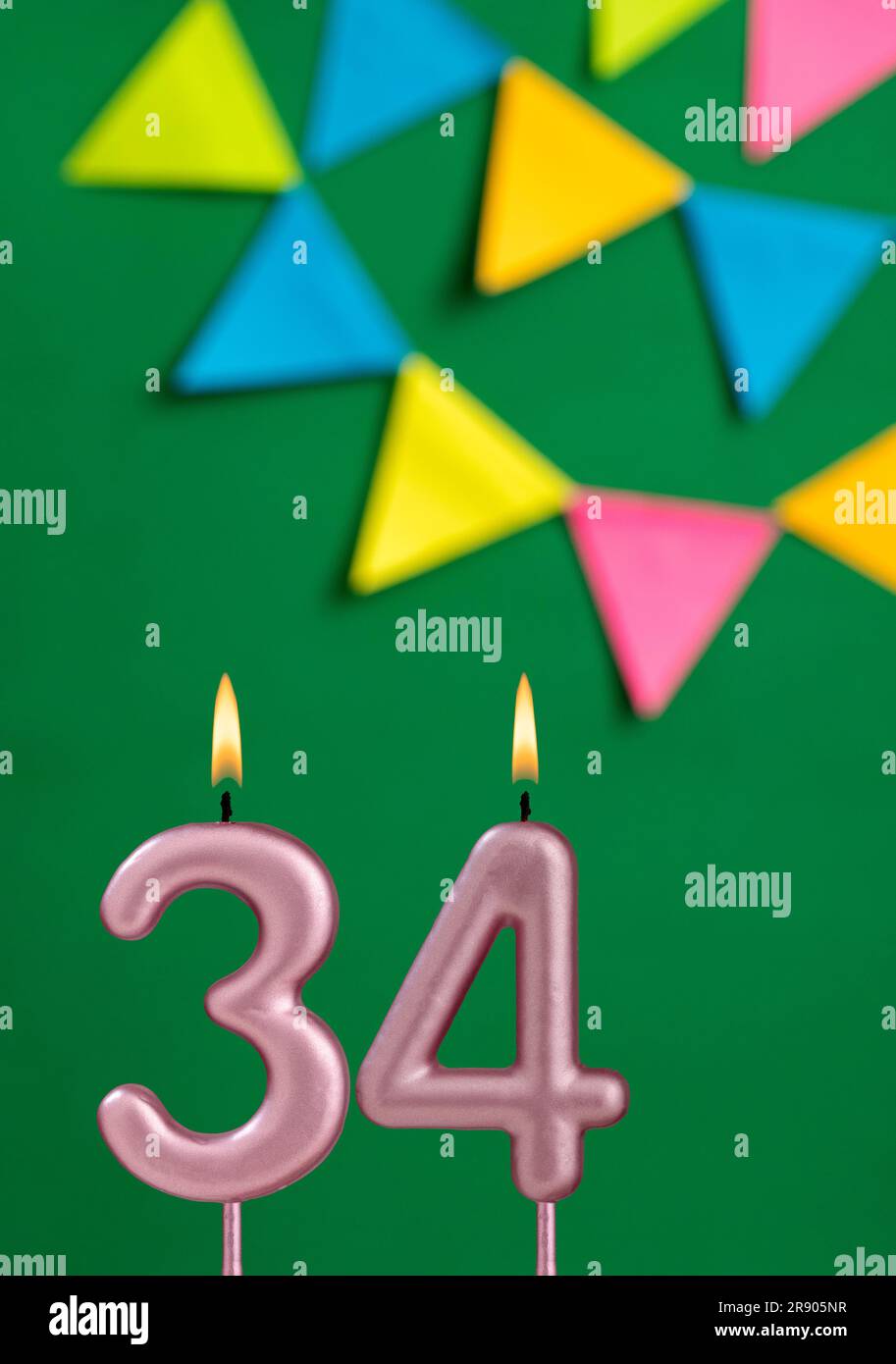 Number 34 birthday candle - Anniversary celebration in green color ...