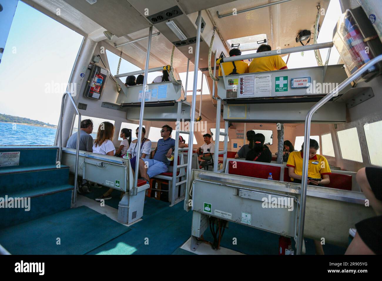 Transfer inside lifeboat tender of asian cruise ship SUPERSTAR VIRGO ...