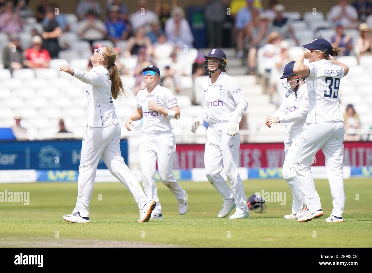 England's Sophie Ecclestone (left) celebrates after taking the wicket ...