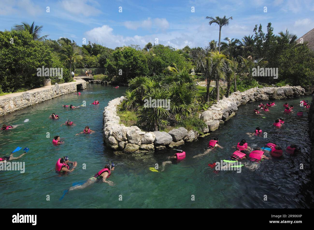 Visitors in underground river, Yucatan, underground, Xcaret Eco Park ...