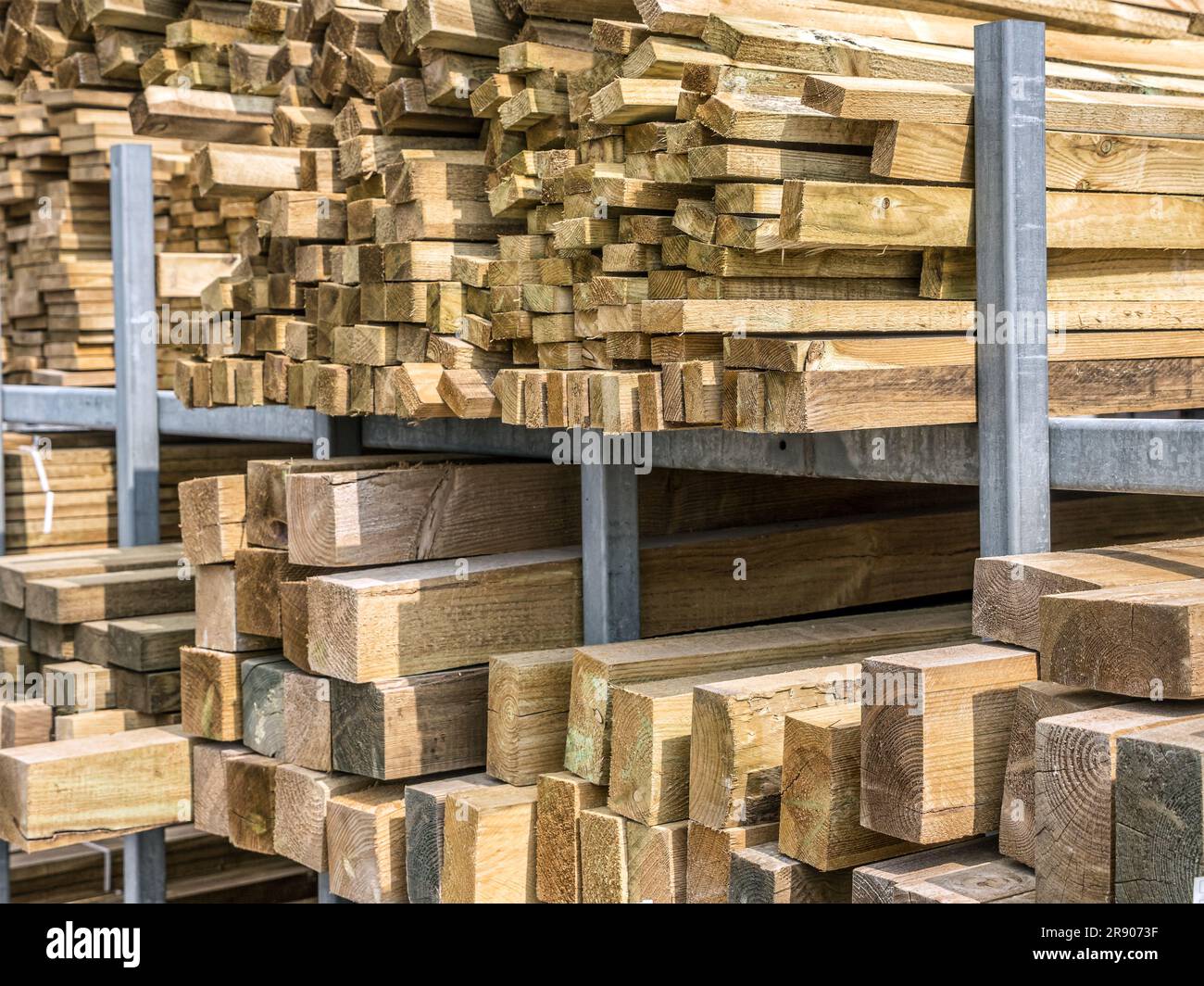 Timber stock stacked up in layers Stock Photo - Alamy