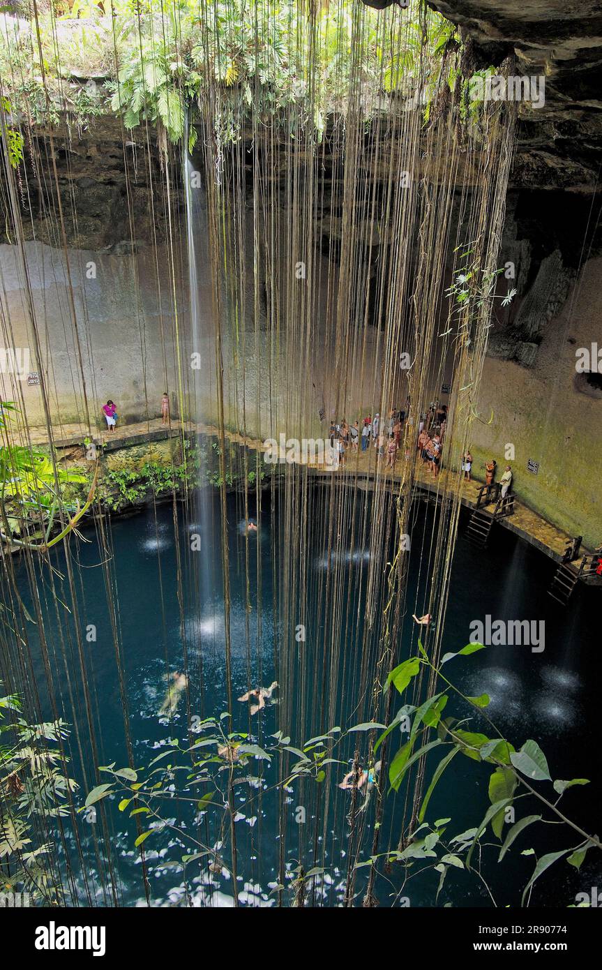 Bathers in the water, Ik Kil, Blue Cenote, Eko Park, near Chichen Itza ...