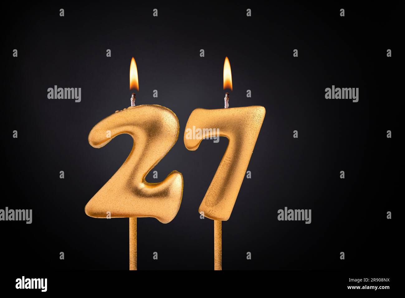 Golden candle 27 with flame - Birthday card on dark luxury background ...