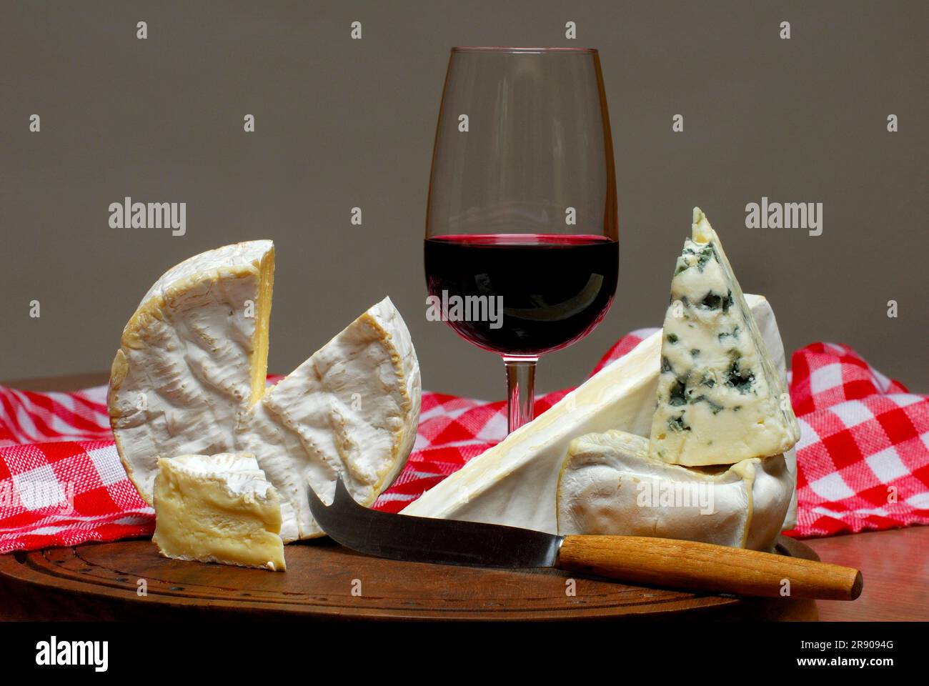 Different kinds of soft cheese and glass of red wine, Camembert, Brie ...