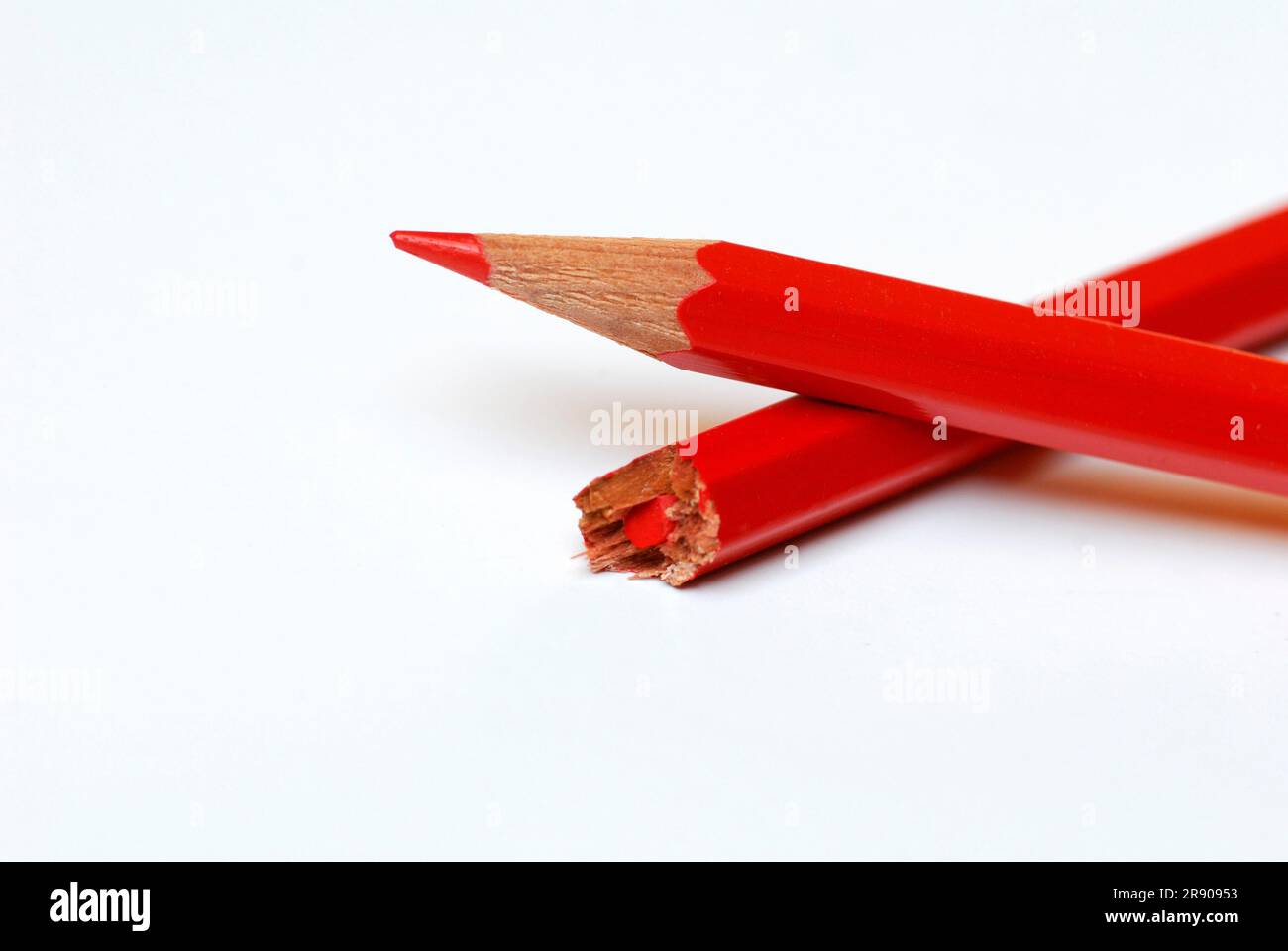 Red crayon, broken Stock Photo - Alamy