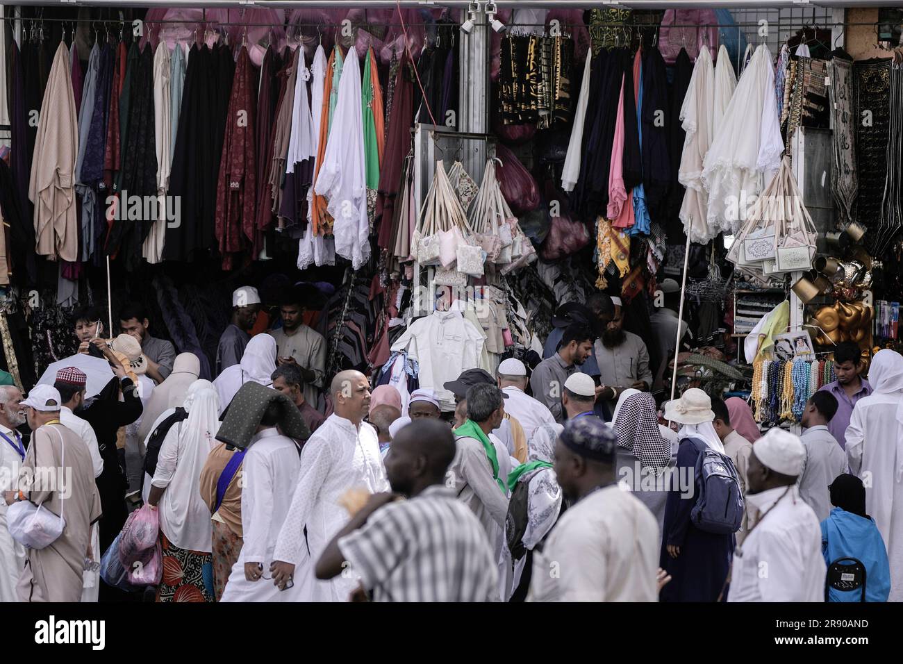 Muslim pilgrims buy souvenirs outside the Grand Mosque, during the ...