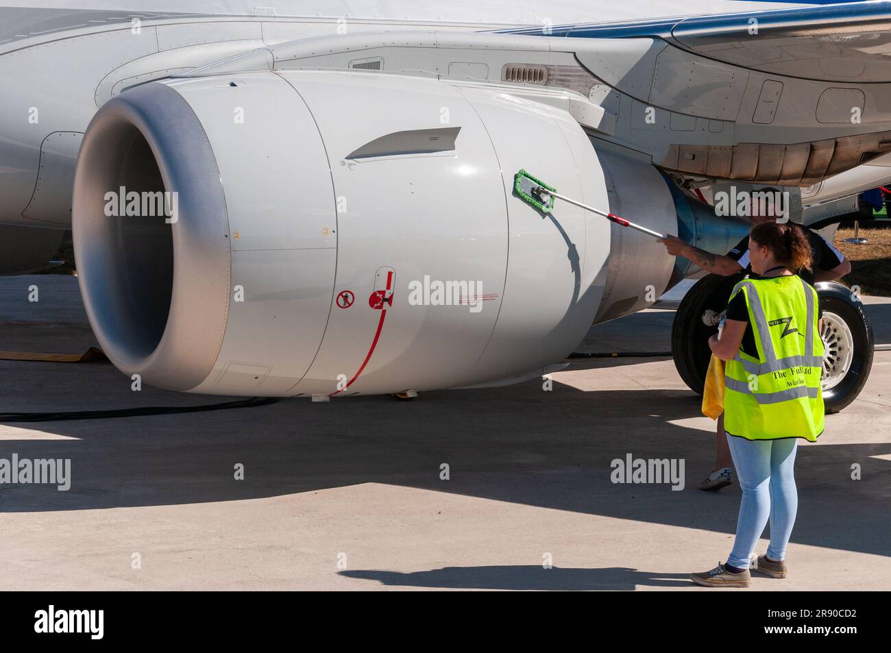 The Full Wax Ltd polishing an airliner jet plane exhibit at the ...