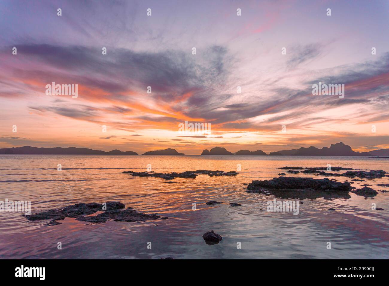 Dramatic sunset at Las Cabanas Beach, El Nido,Palawan, The Philippines ...