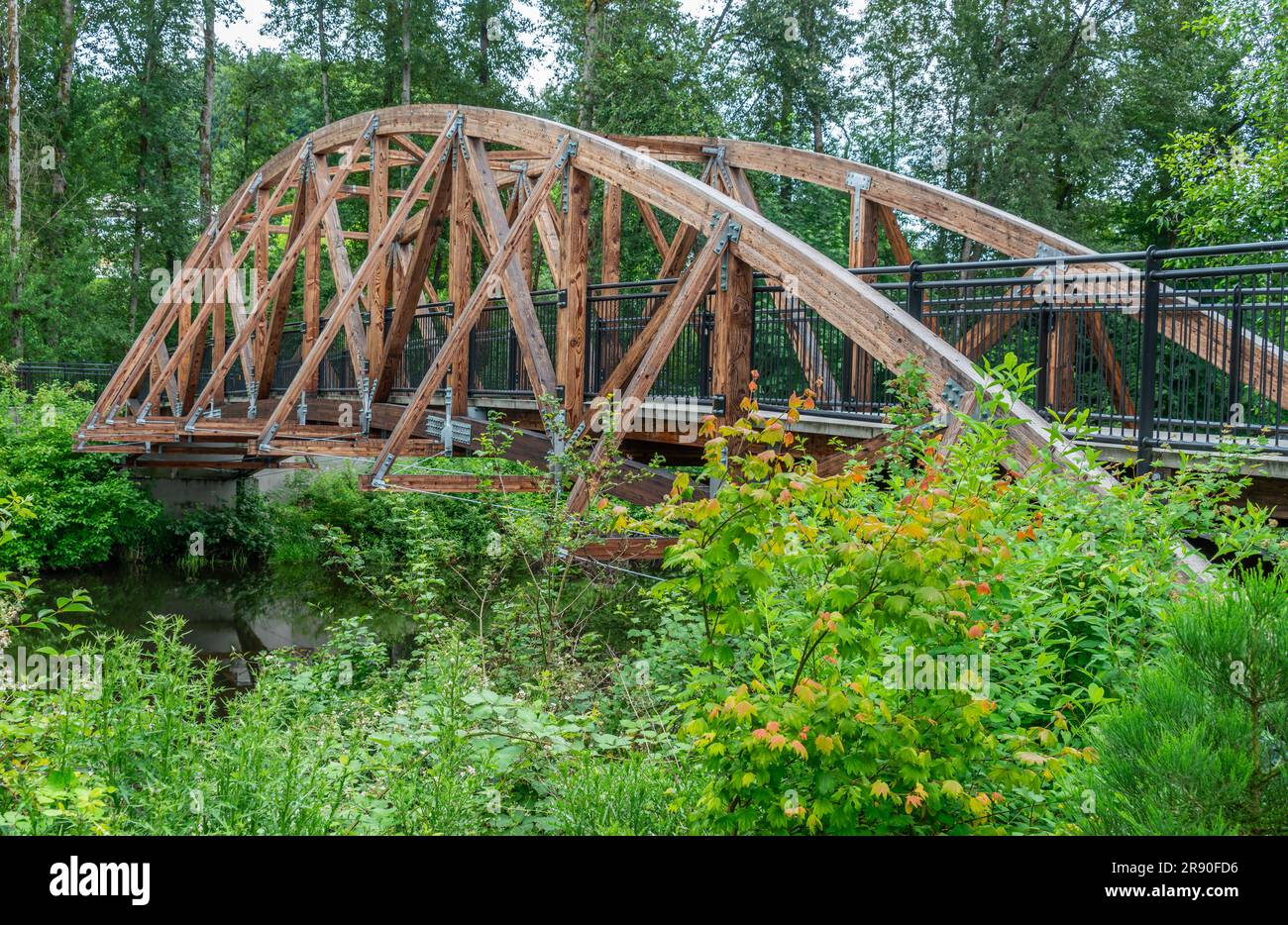 A pedestrian bridge over the Sammamish Riverr in Bothell, Washington ...
