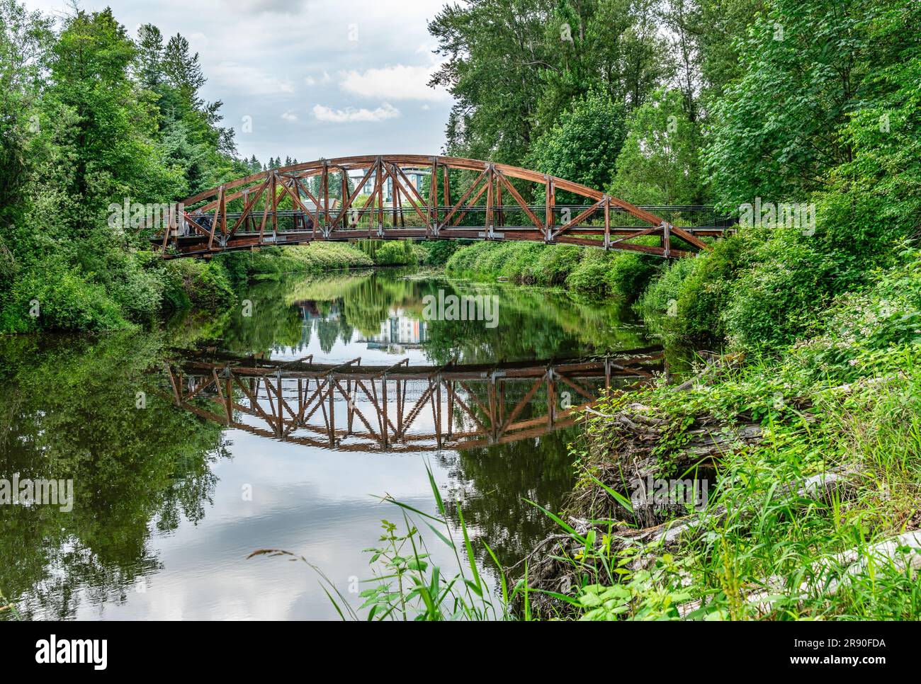 A pedestrian bridge over the Sammamish Riverr in Bothell, Washington ...