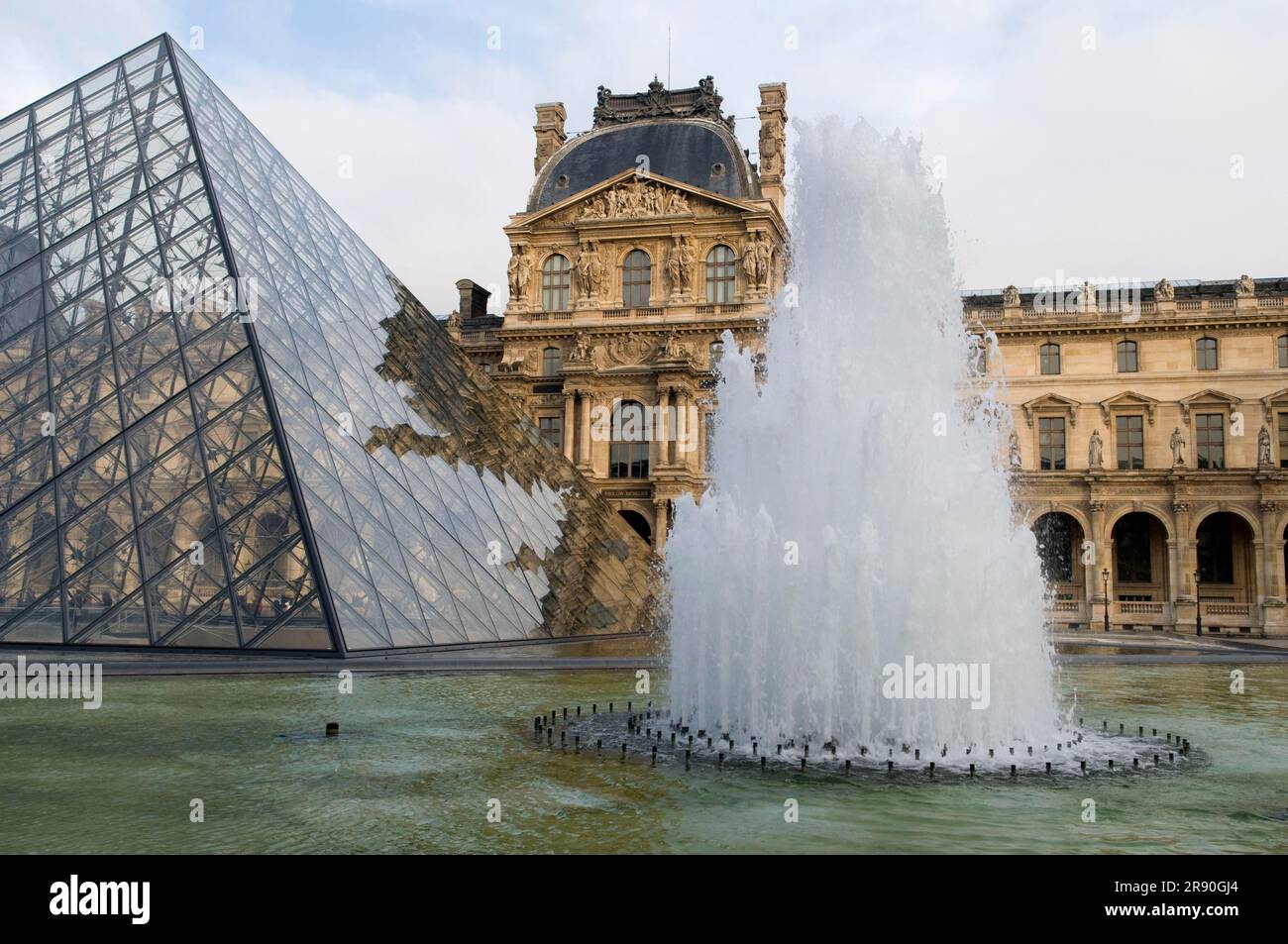 Pyramid and Fountain, Louvre, Paris, France Stock Photo - Alamy
