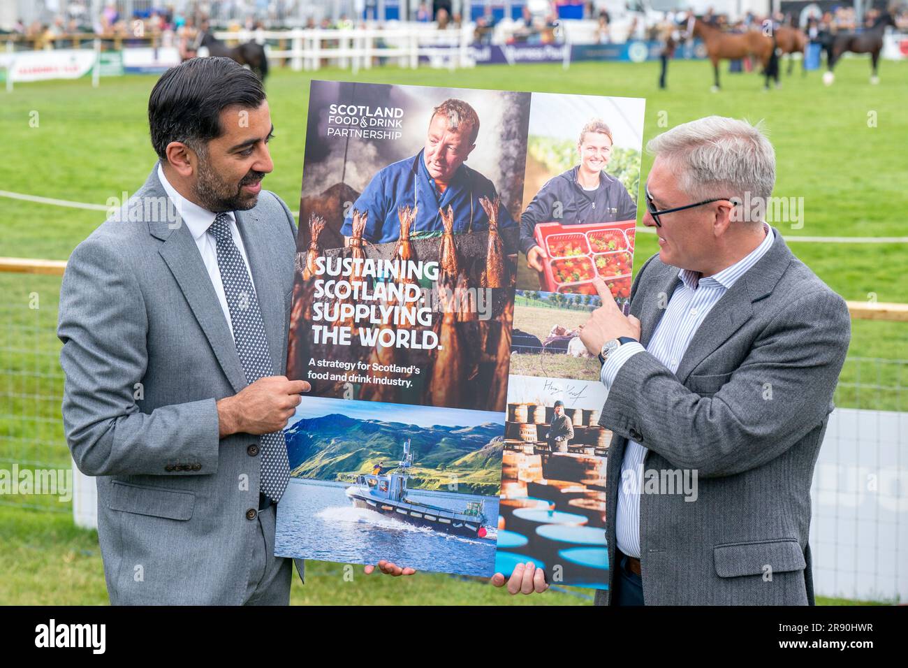 First Minister Humza Yousaf with Iain Baxter (right) chief executive of ...