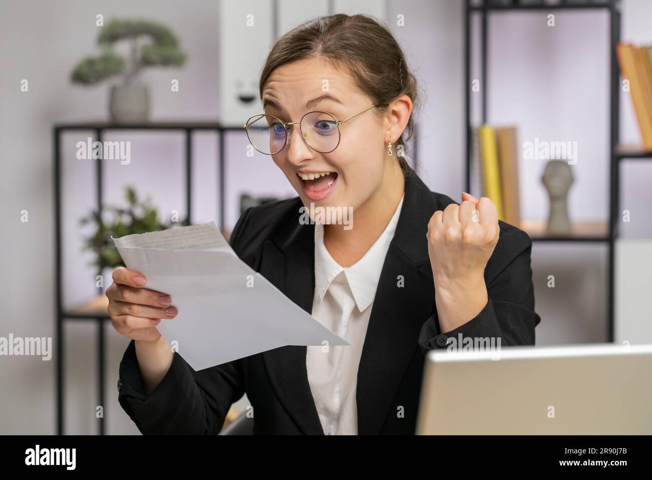 Caucasian business woman open envelope letter reading it. Career growth ...