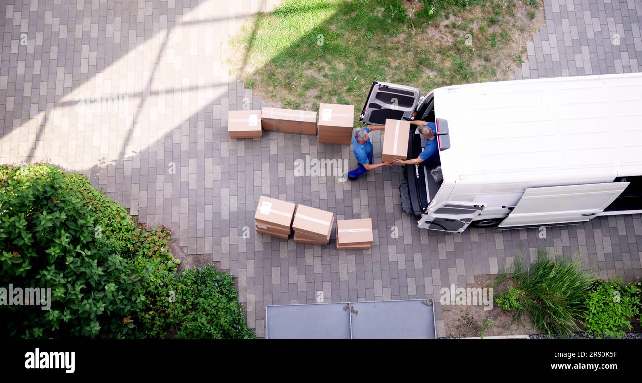 Delivery Truck Movers Moving Furniture Loading Van Stock Photo - Alamy
