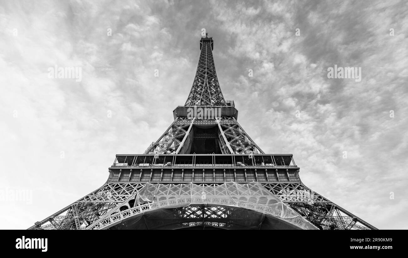 Morning view of Eiffel Tower from bottom. Paris, France. Black and ...