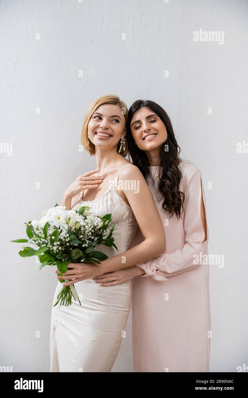 special occasion, bridesmaid hugging bride, friendship goals, grey ...