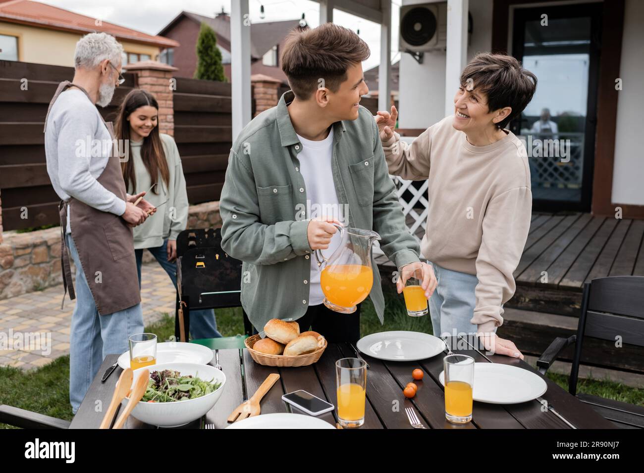 celebration of parents day, modern parenting, happy middle aged mother ...