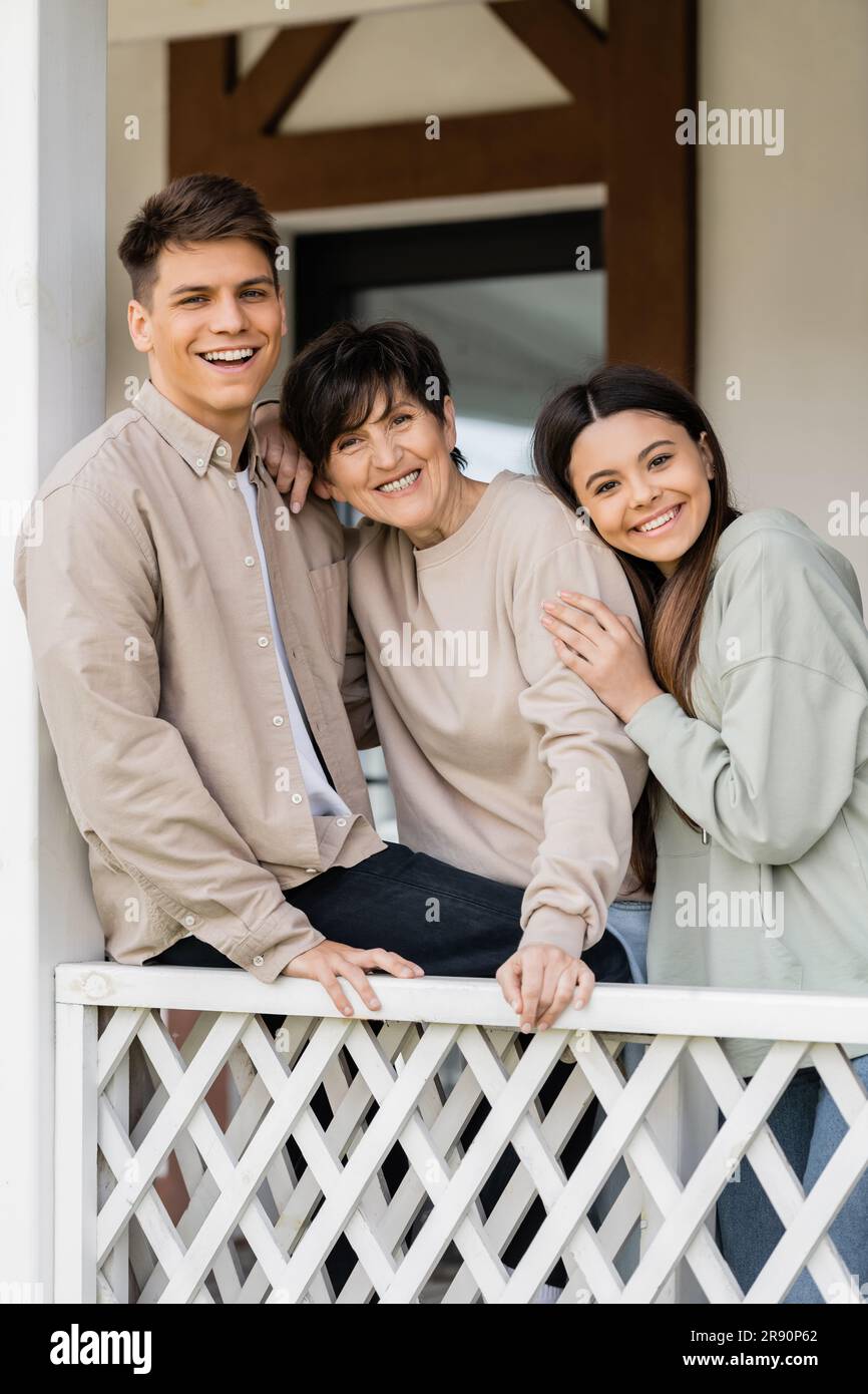 parents day concept, middle aged woman smiling with cheerful daughter ...