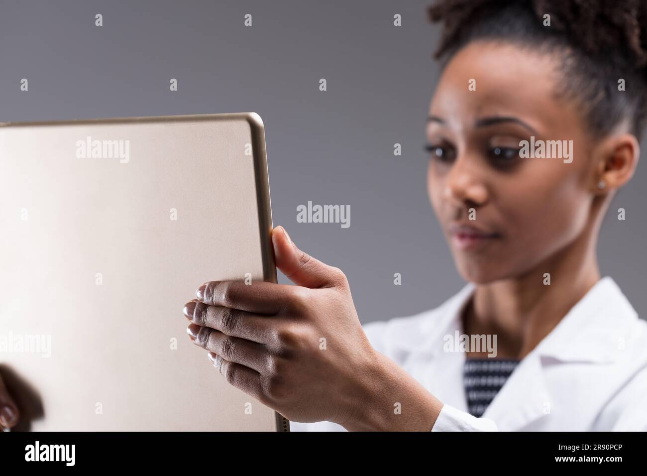 Data and quality control with human oversight. In focus, an electronic ...