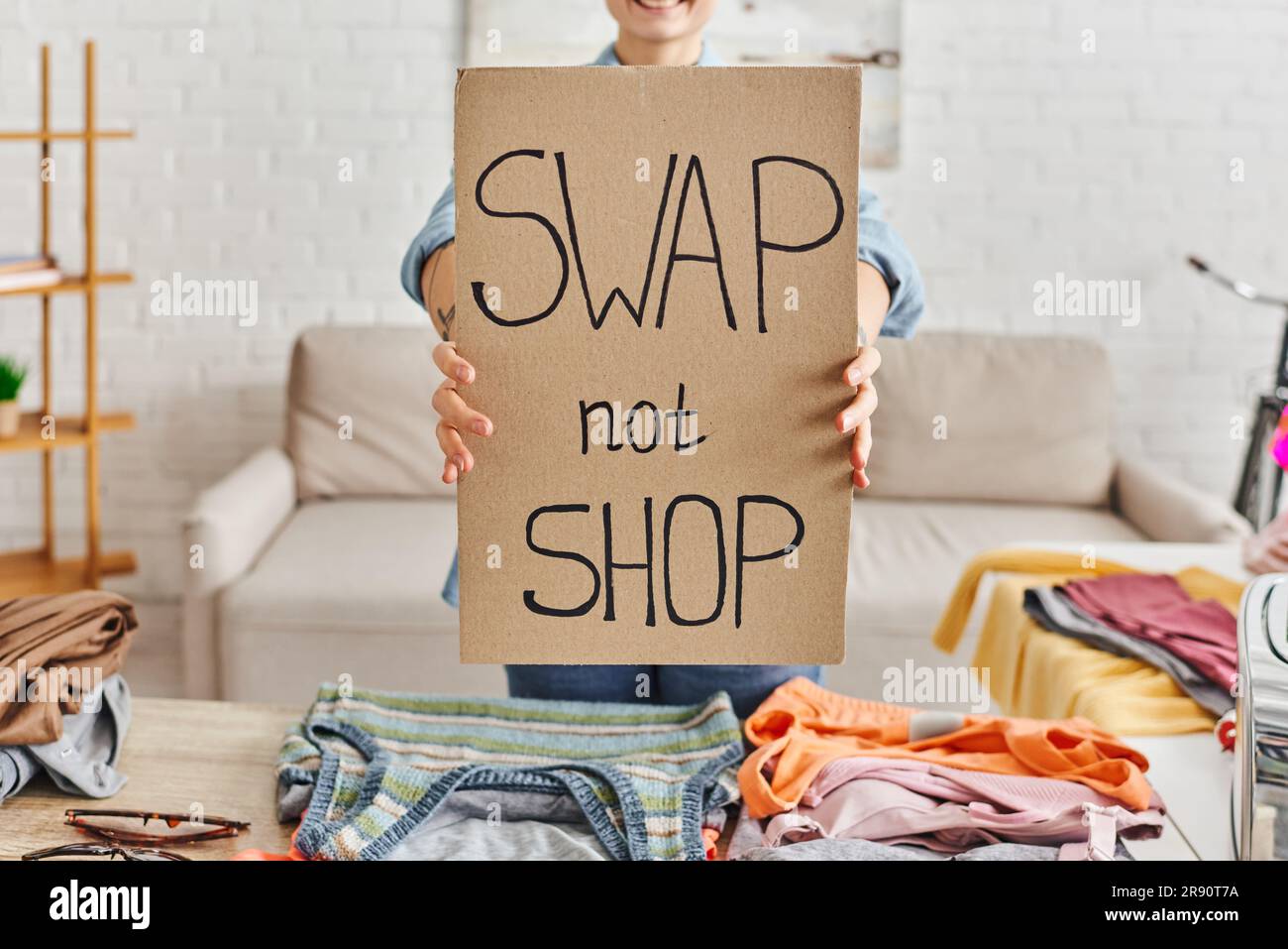 exchange market, partial view of young and cheerful woman showing card ...