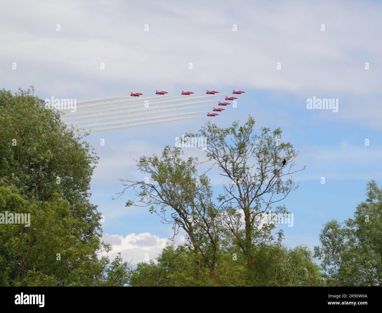 Benson, UK. 23rd June, 2023. The Red Arrows perform a flypast at RAF ...