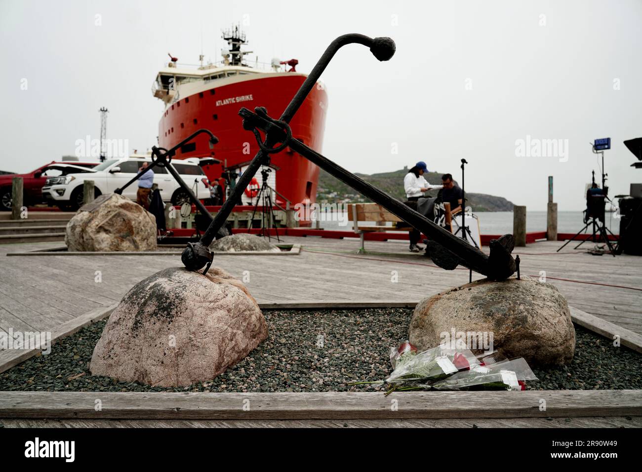 St John's resident Patsy Power places flowers at an anchor at King's ...