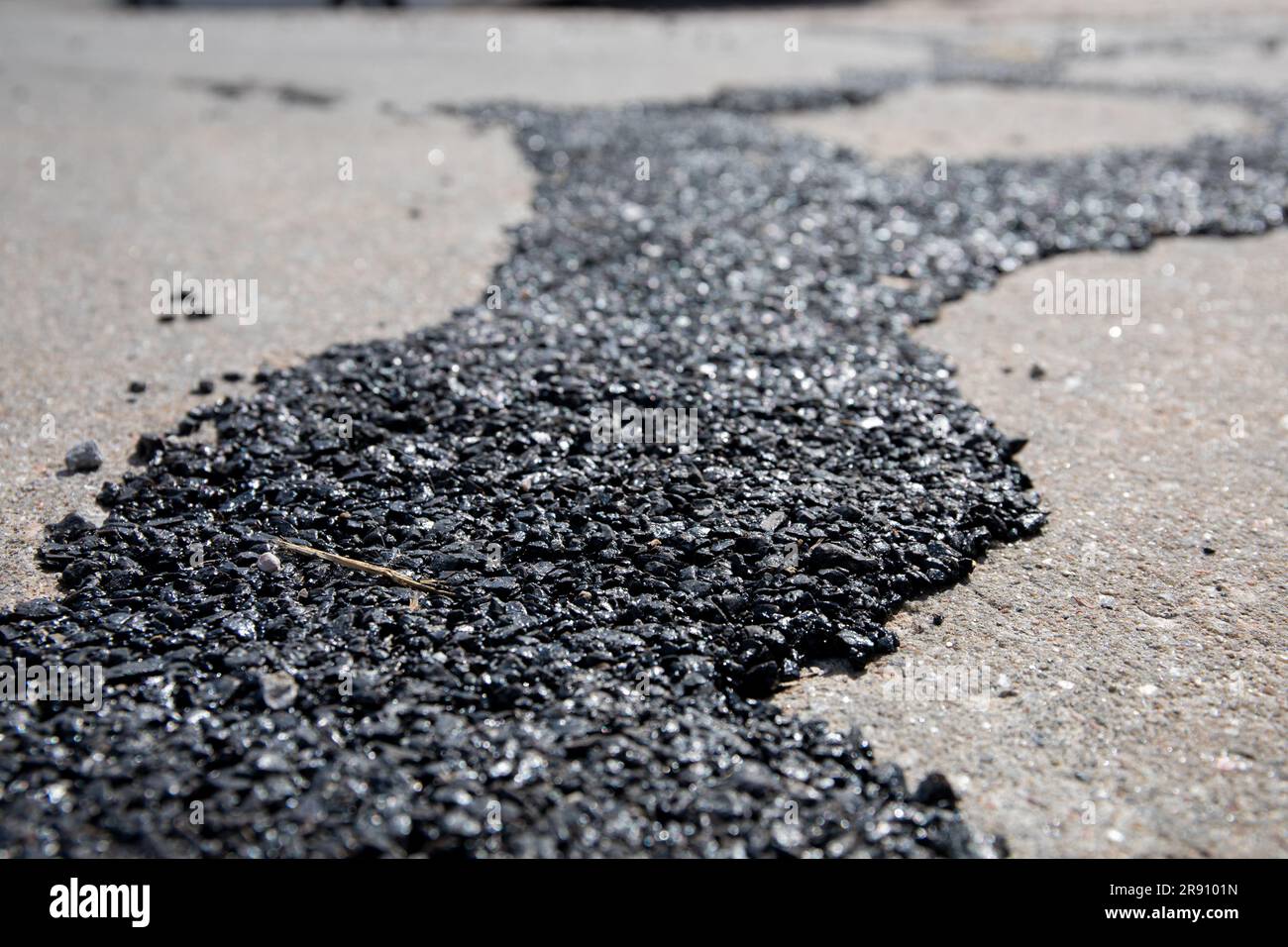 Concrete crack filled with asphalt hi-res stock photography and images ...