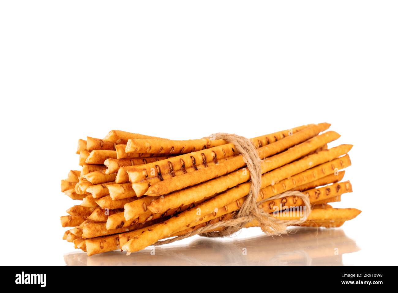 Straw is a bakery product. Several straws tied with jute thread ...