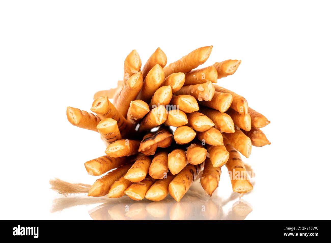 Straw is a bakery product. Several straws tied with jute thread ...