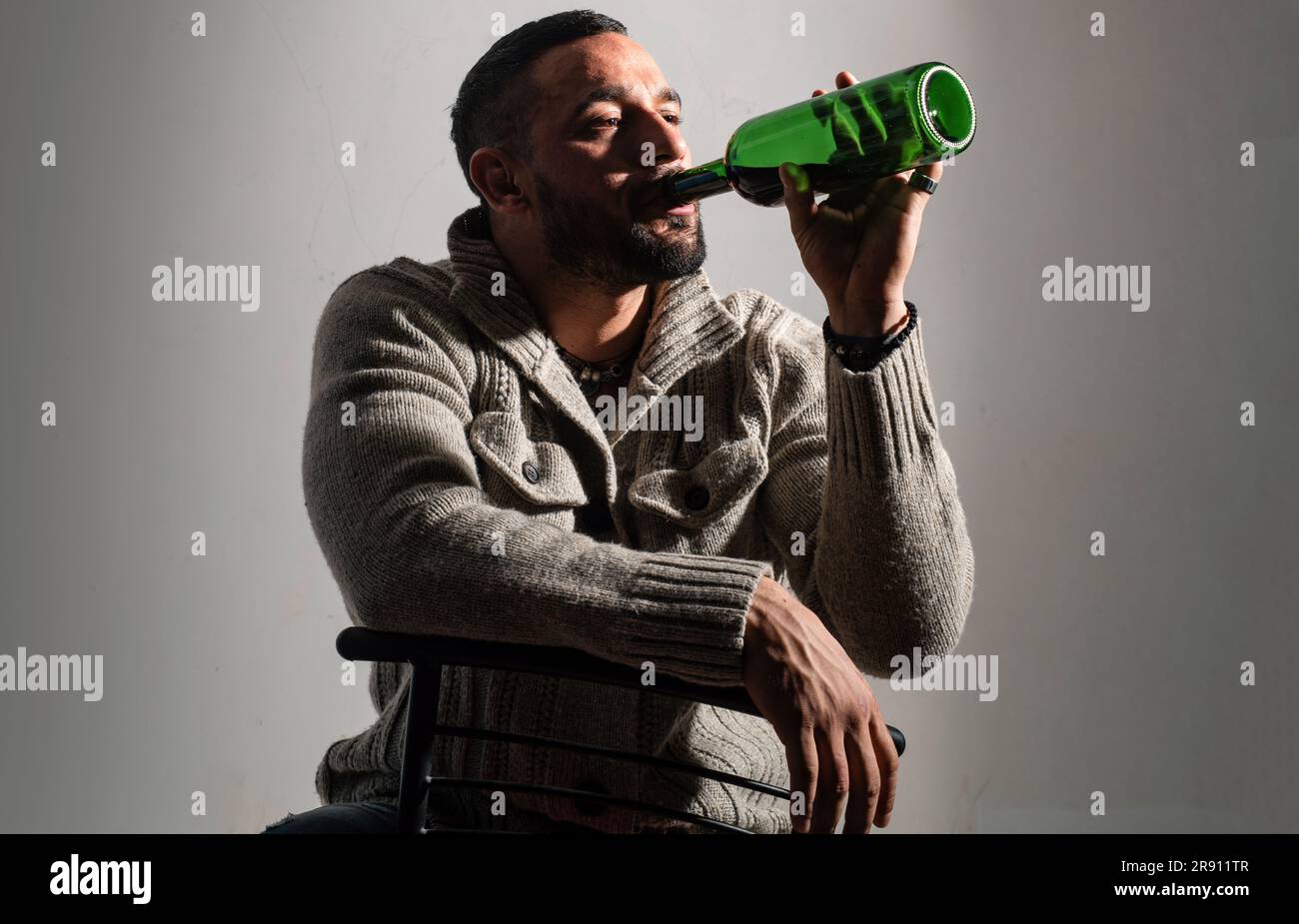 alcoholism, alcohol addiction and people concept. male alcoholic with ...