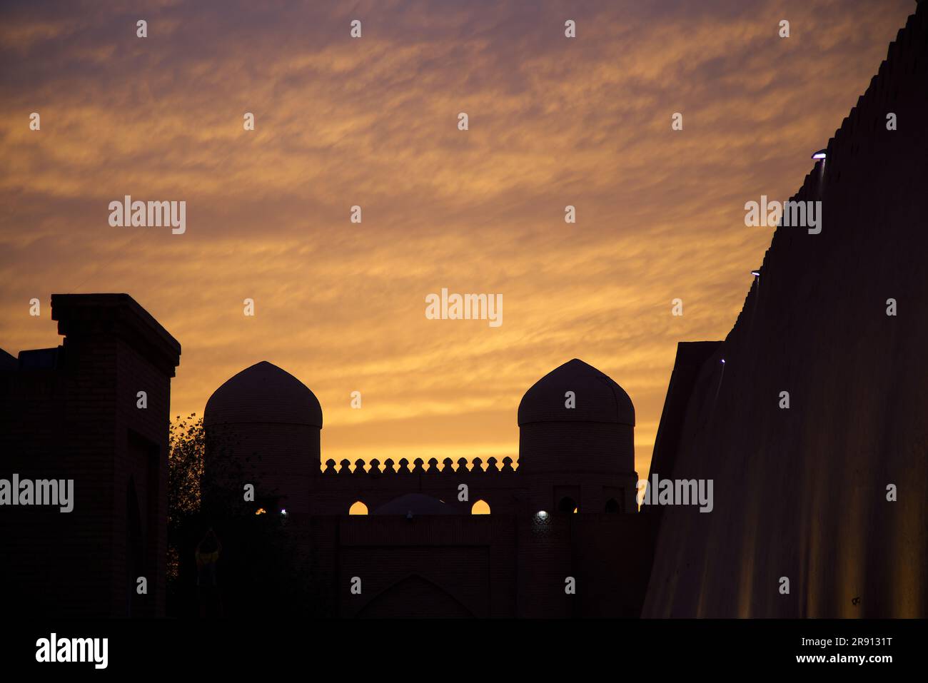 The Ota Darvoza at sunset in Khiva, Uzbekistan Stock Photo - Alamy