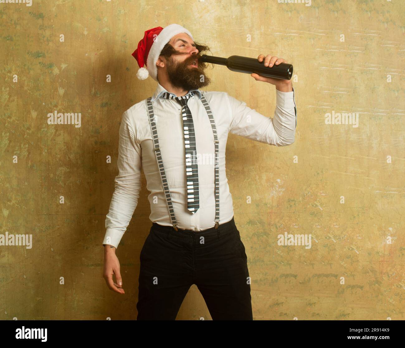 Bad drunk santa. Christmas man with beard at home alone. Winter holiday ...