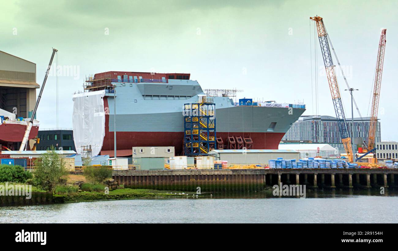 Glasgow, Scotland, UK 23rd June, 2023. HMS Cardiff half ship emerges at ...