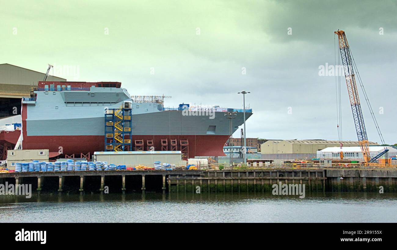 Glasgow, Scotland, UK 23rd June, 2023. HMS Cardiff half ship emerges at ...