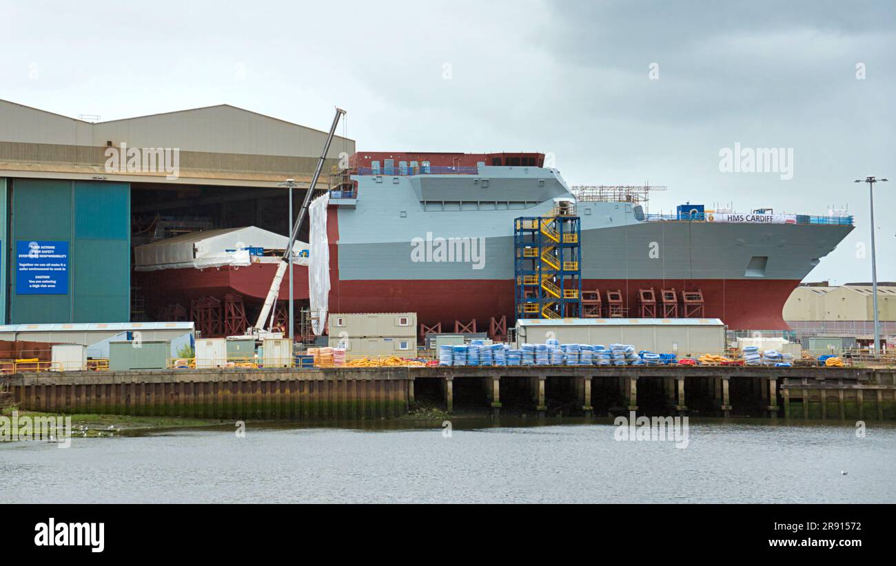 Glasgow, Scotland, UK 23rd June, 2023. HMS Cardiff half ship emerges at ...
