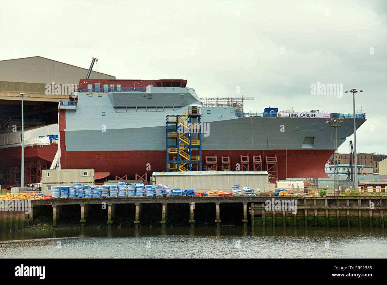 Glasgow, Scotland, UK 23rd June, 2023. HMS Cardiff half ship emerges at ...
