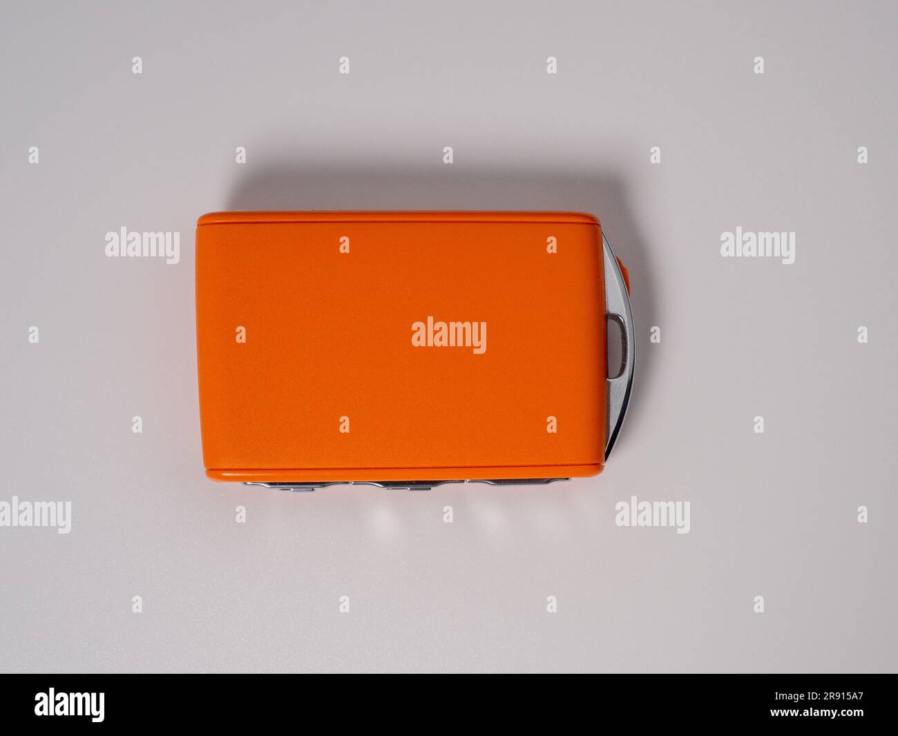 Modern wireless orange car ignition key on a white background. Wireless ...