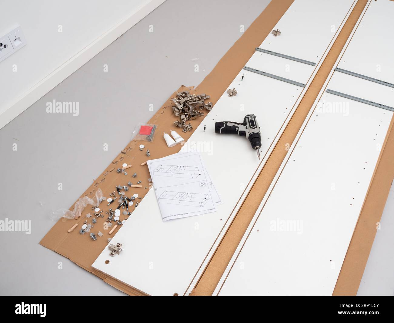 Assembly of furniture and tools for self-assembly of furniture on the ...