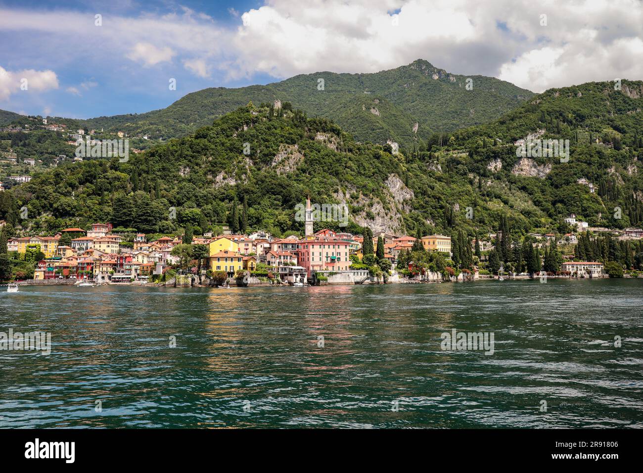 Lake Como with Varenna Town on Shore and Rocky Green Hills in Italy ...