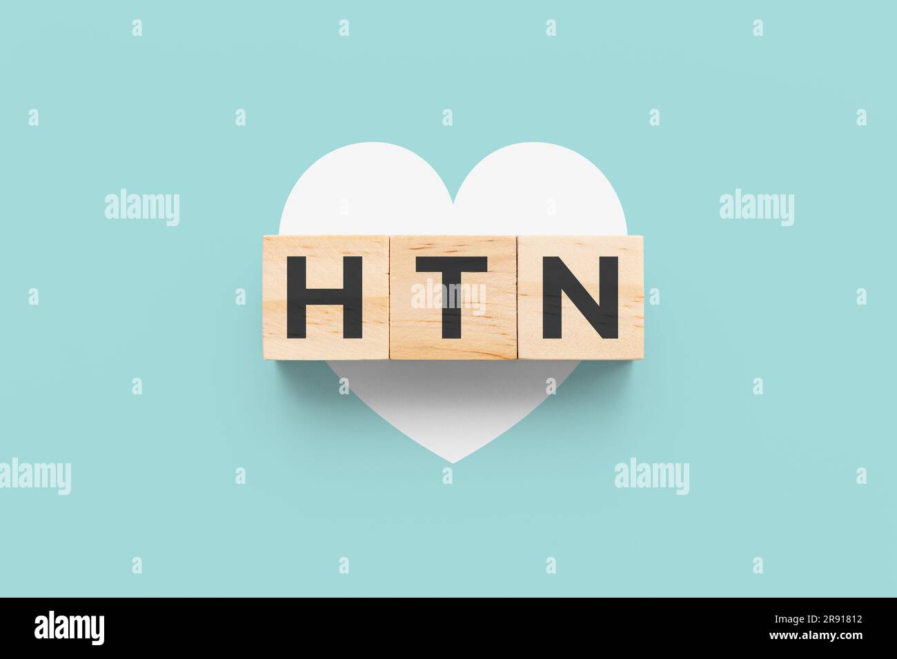 HTN (Hypertension) wooden cubes on blue green background with white ...