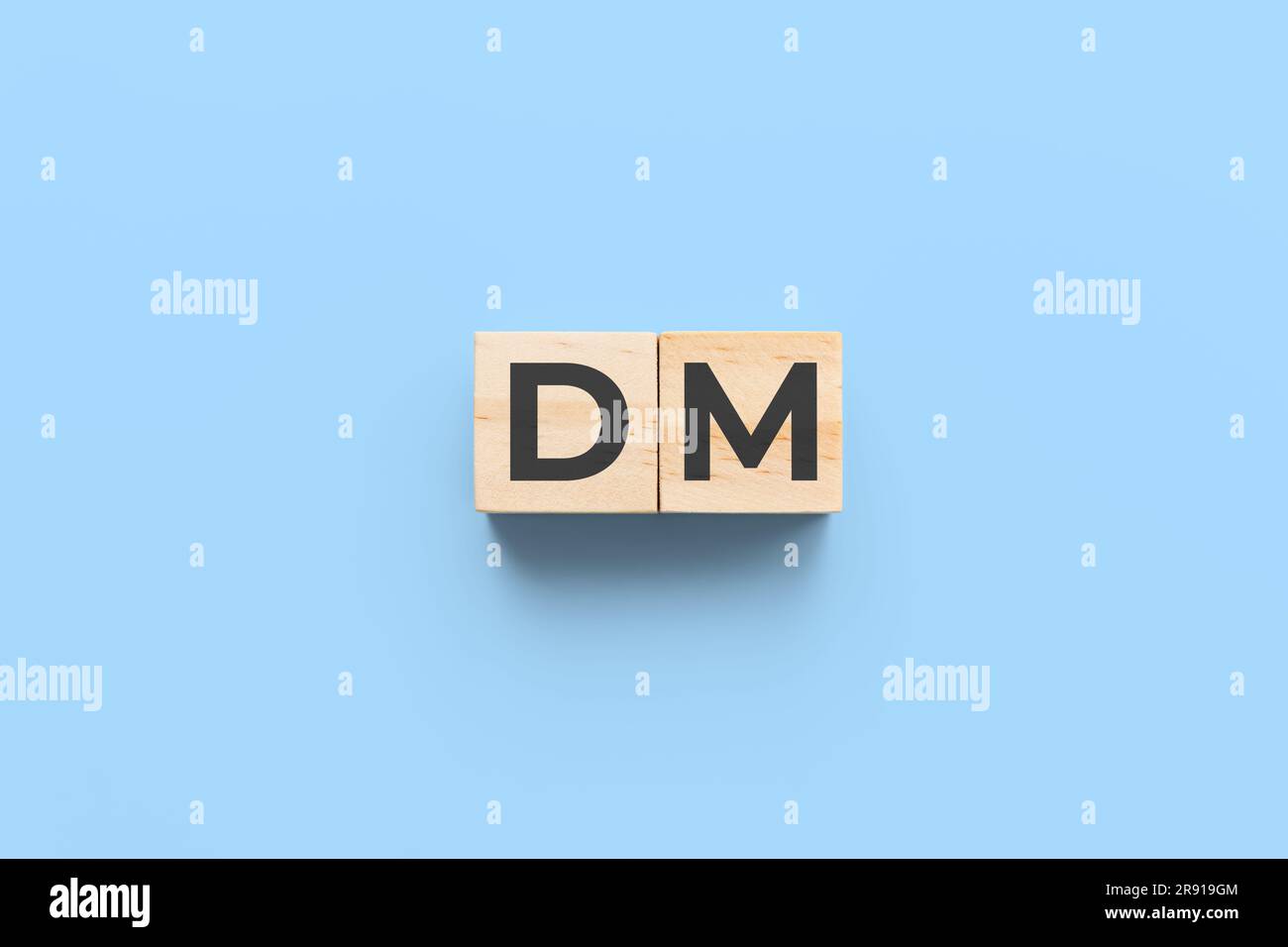 DM (Diabetes Mellitus) wooden cubes on blue background Stock Photo - Alamy