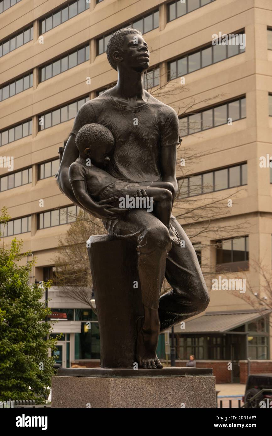 Father and son sculpture to honor Peter Spencer at Spencer Plaza in ...