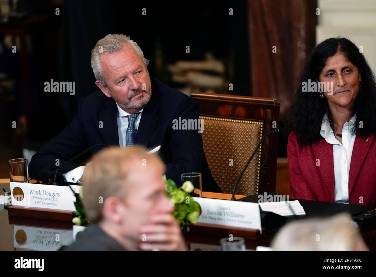 Mark Douglas, President and CEO of FMC Corp., left, and Sunita Williams ...