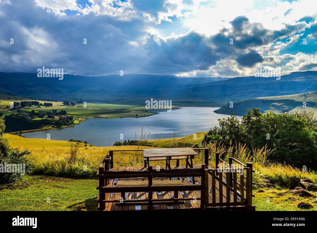 solar flare and sun rays over Maloti Drakensberg mountains and bell ...