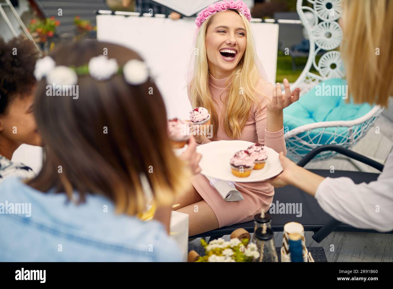 A group of girlfriends enjoying themselves at a bachelorette party. The ...